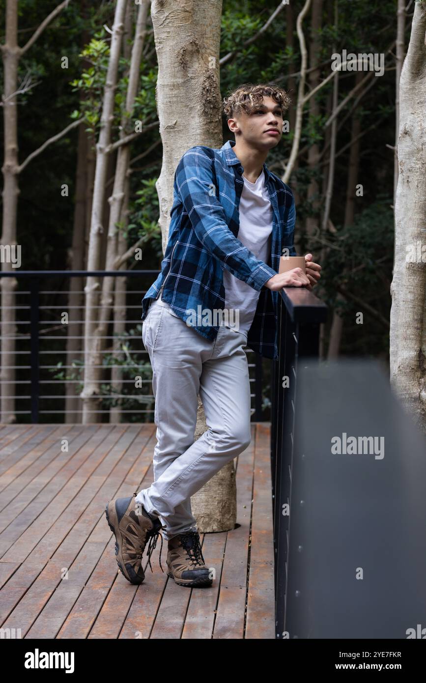 Sitting outdoor young man in hi-res stock photography and images - Alamy