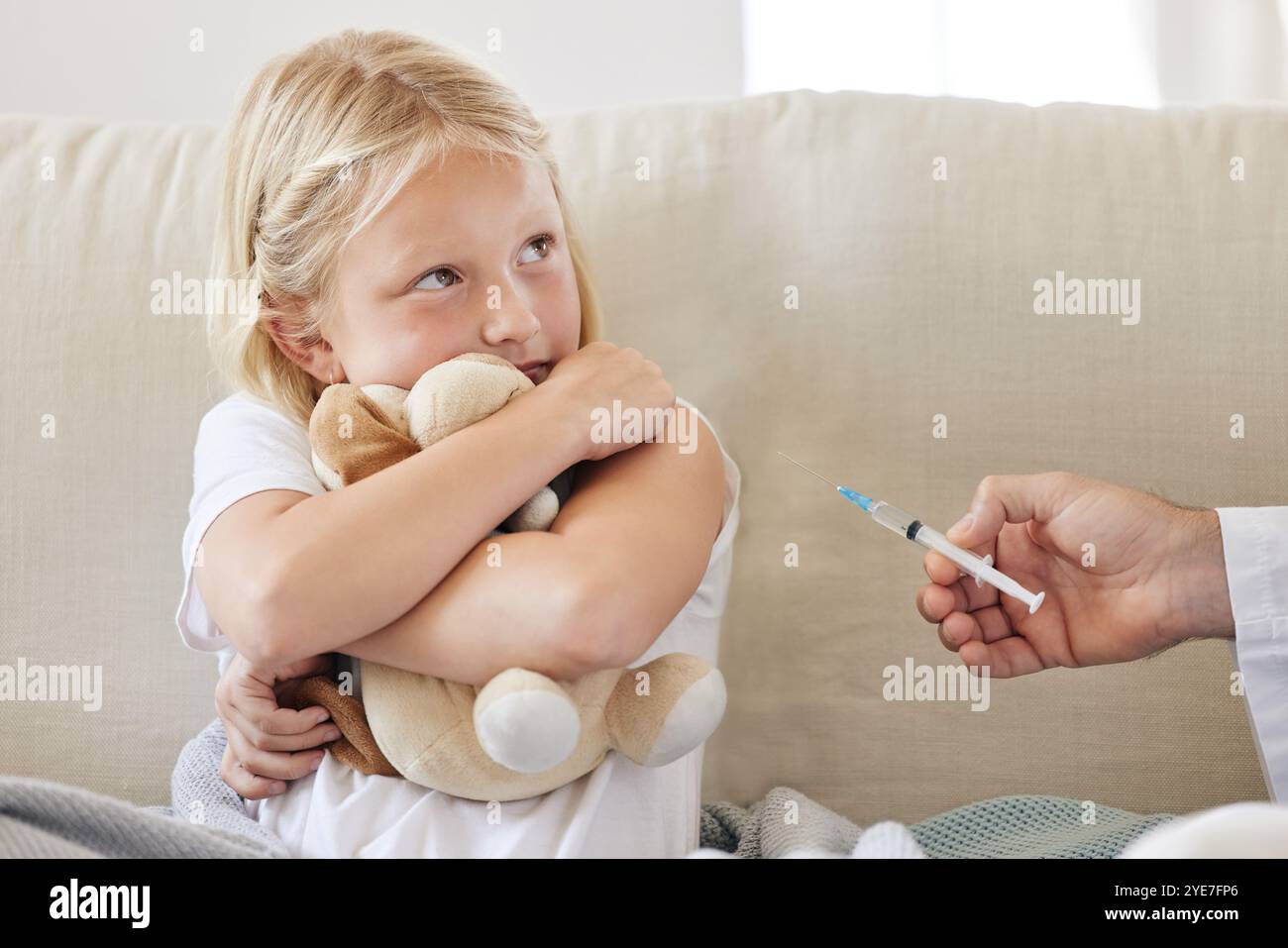 Child, doctor and scared in house for vaccine, wellness and healthcare ...