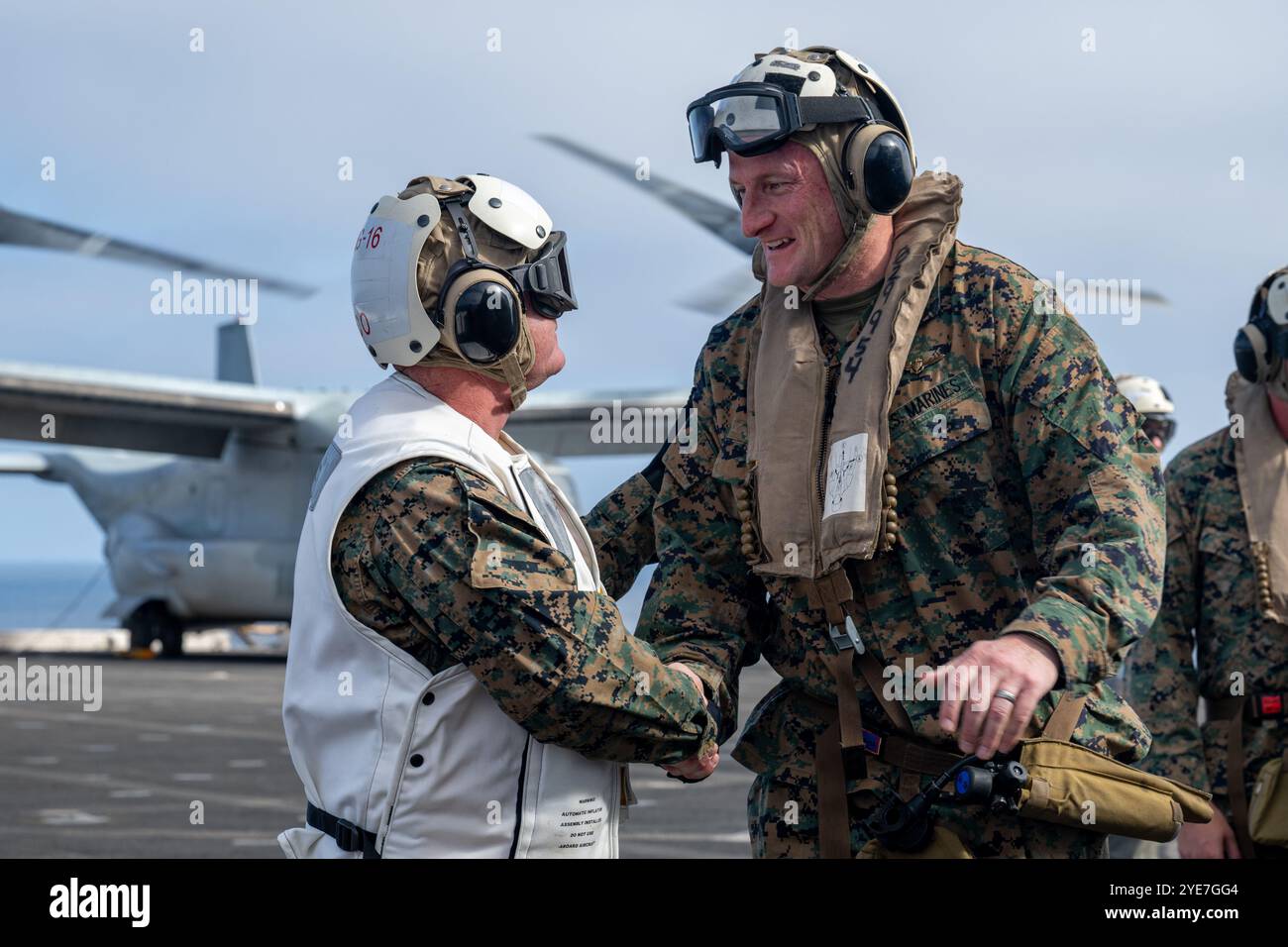 U.S. Marine Corps Col. Kevin Hunter (left), the commanding officer of Marine Aircraft Group 16 ...