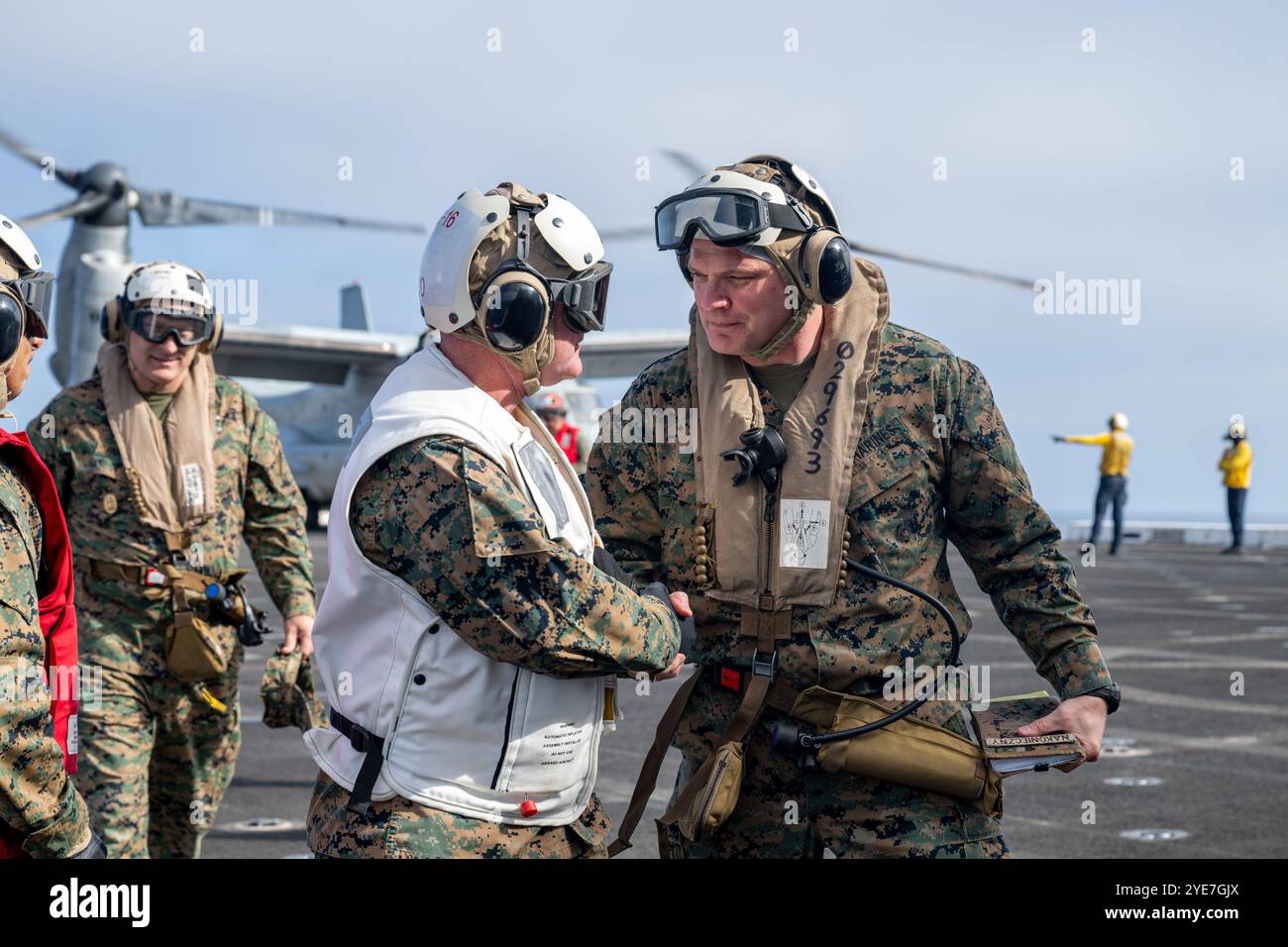 U.S. Marine Corps Col. Kevin Hunter (left), the commanding officer of Marine Aircraft Group 16 ...