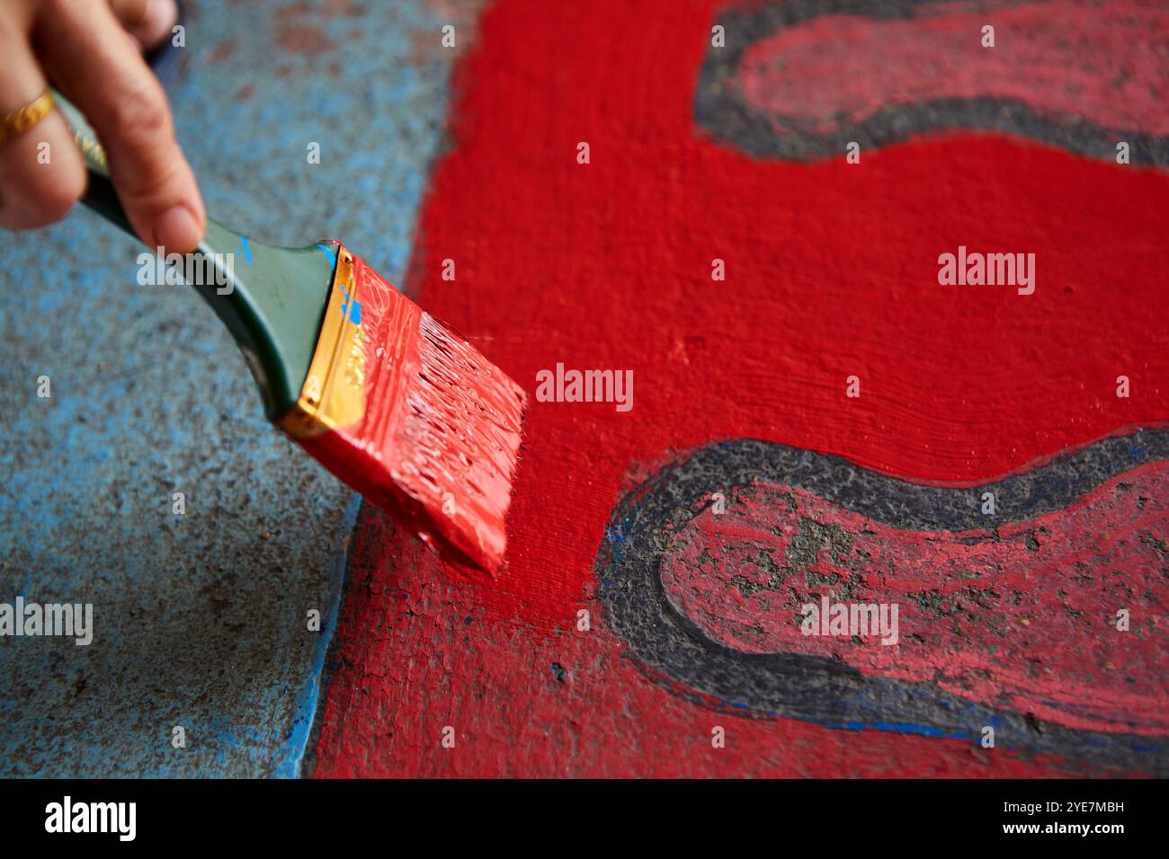 Close-up of hand painting color on playground Stock Photo - Alamy