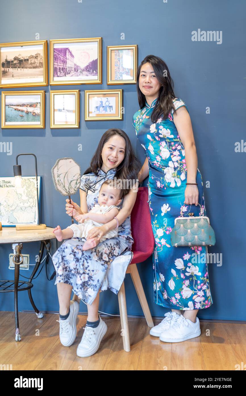Two Taiwanese women in their 30s wearing traditional Chinese clothing ...