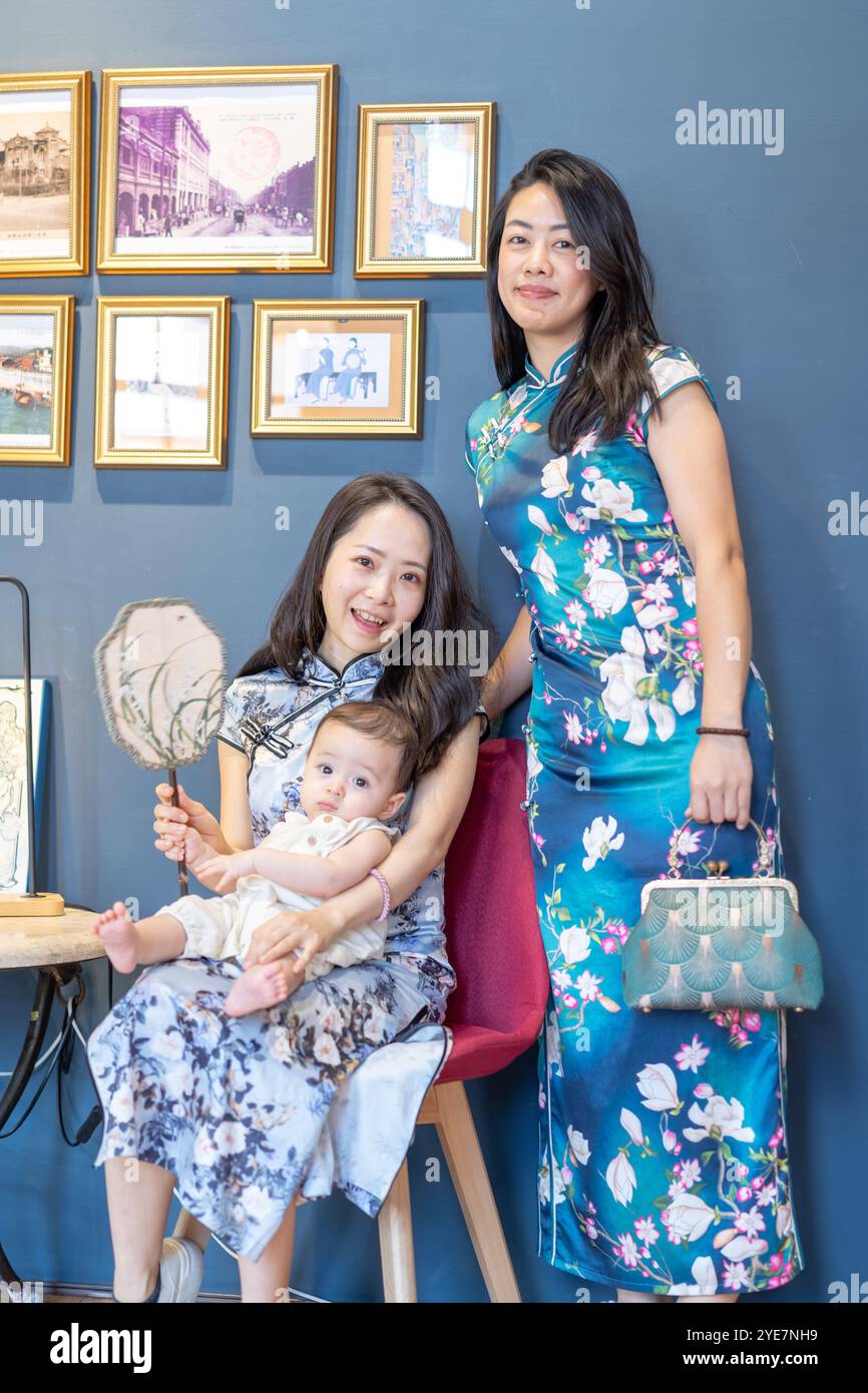 Two Taiwanese women in their 30s wearing traditional Chinese clothing ...