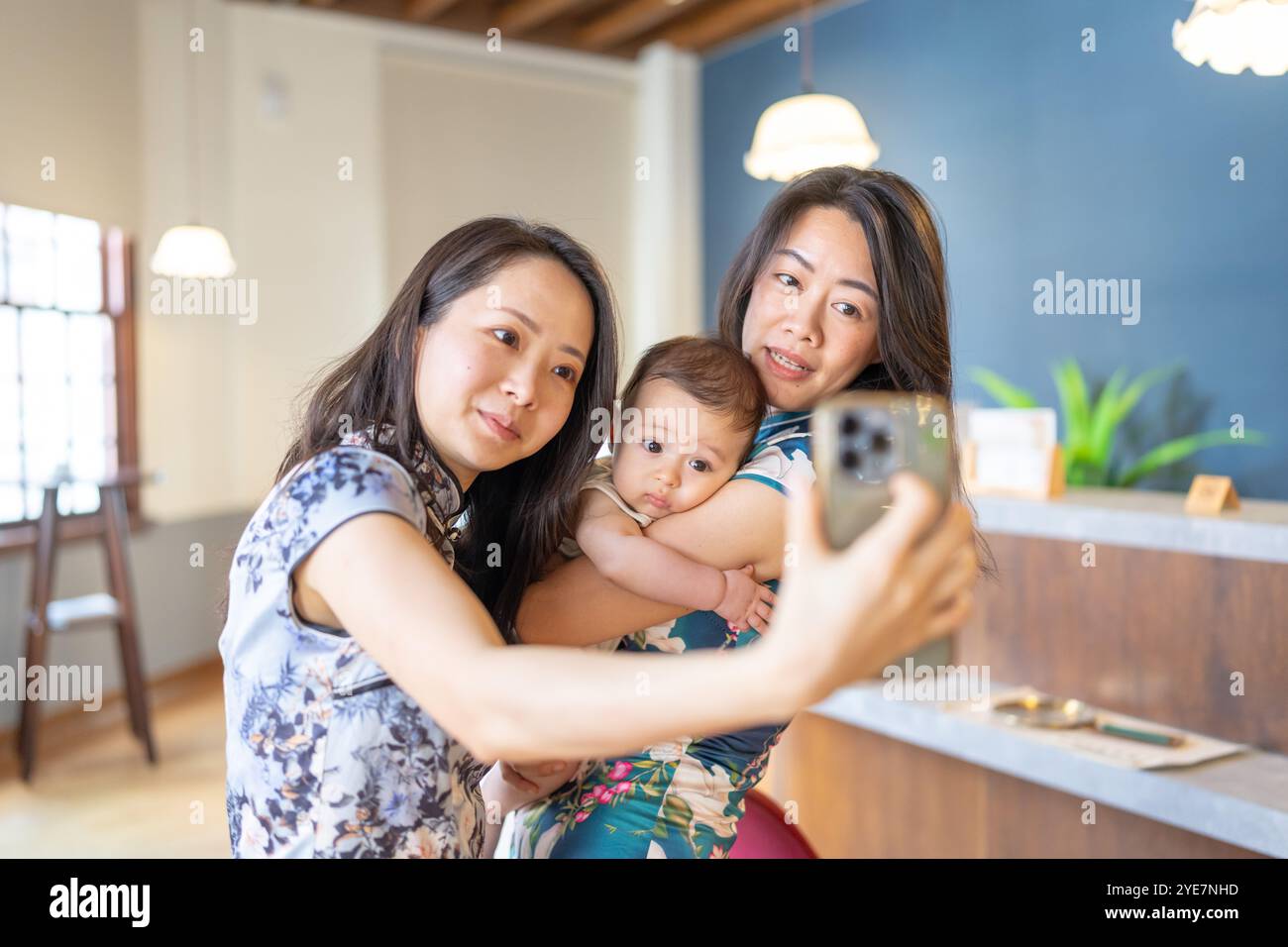 Two Taiwanese women in their 30s wearing traditional Chinese clothing ...