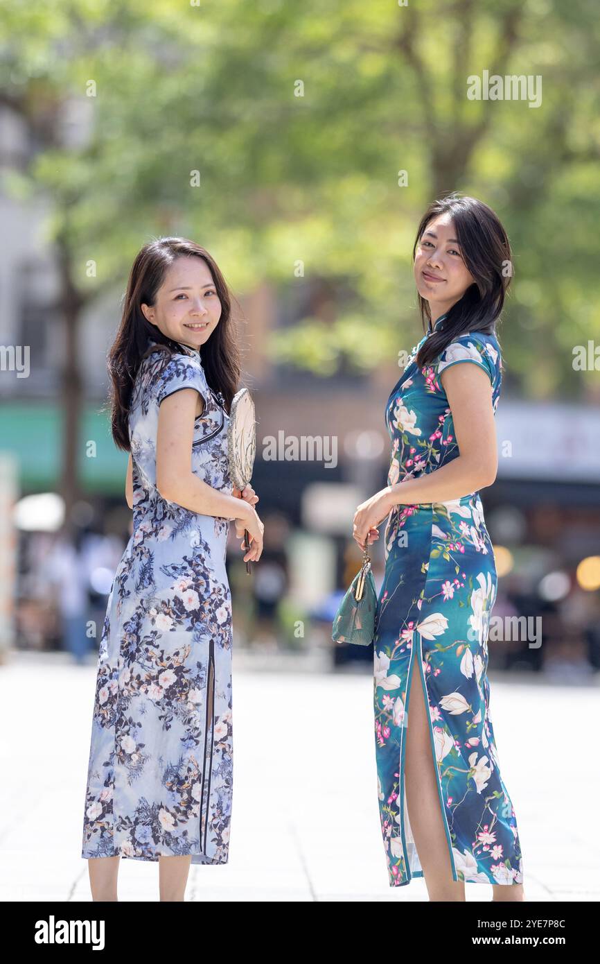 Two Taiwanese women in their 30s wearing traditional Chinese clothing ...