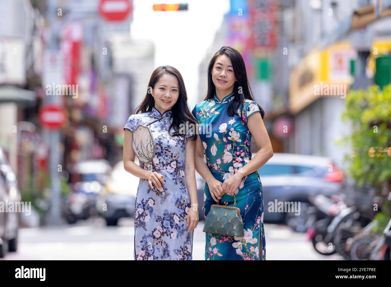 Two Taiwanese women in their 30s wearing traditional Chinese clothing ...