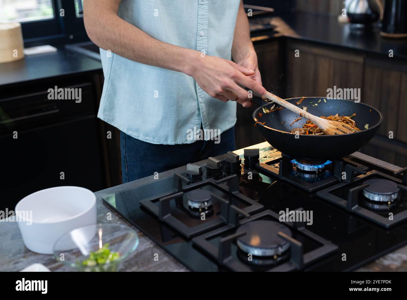 Using wooden spoon stir hi-res stock photography and images - Alamy
