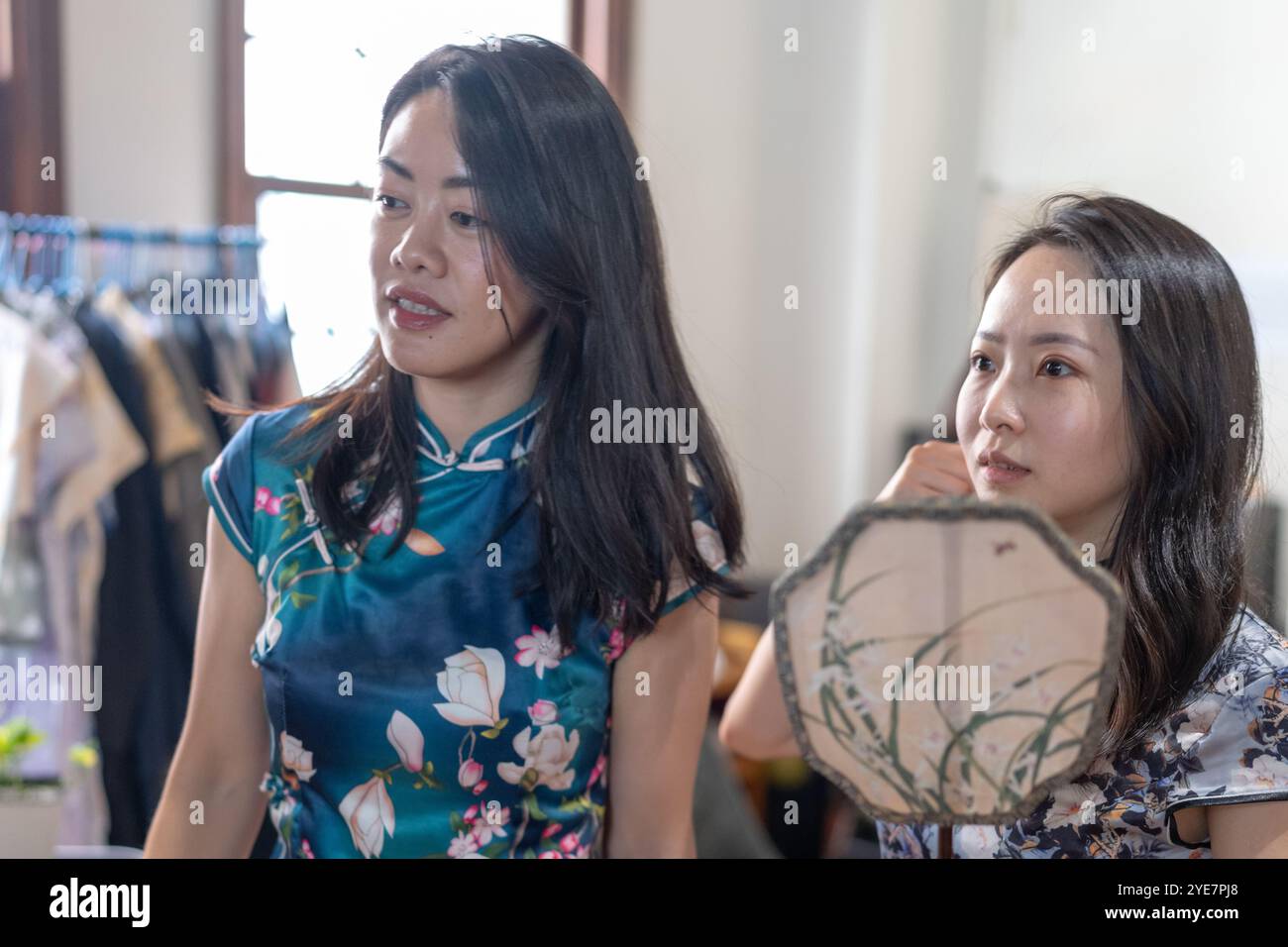 Two Taiwanese women in their 30s are trying on traditional Chinese ...
