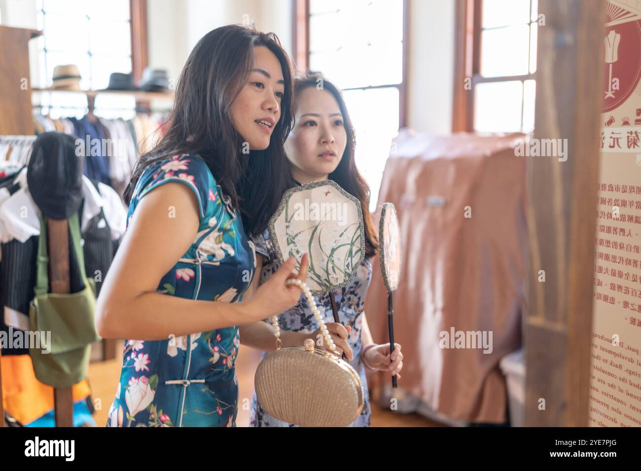 Two Taiwanese women in their 30s are trying on traditional Chinese ...