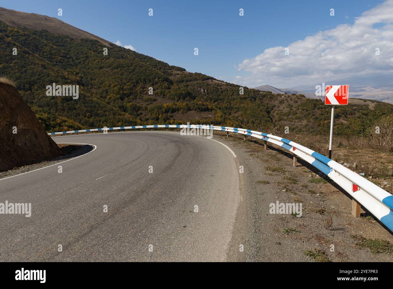 metal road fencing of barrier type on a mountain road. Road and traffic ...