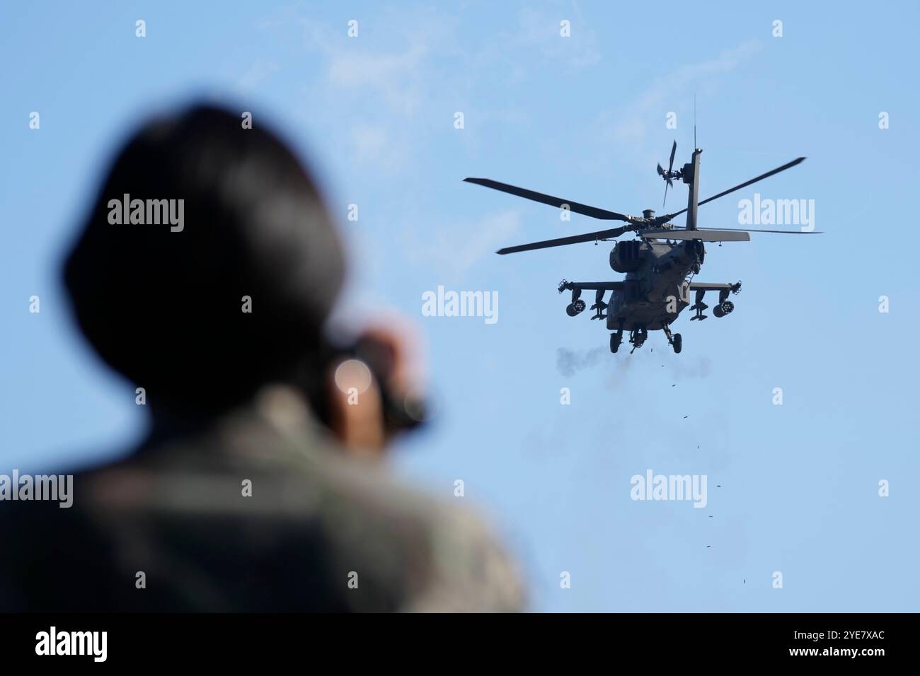 A South Korean army AH-64E Apache helicopter fires during a combined ...