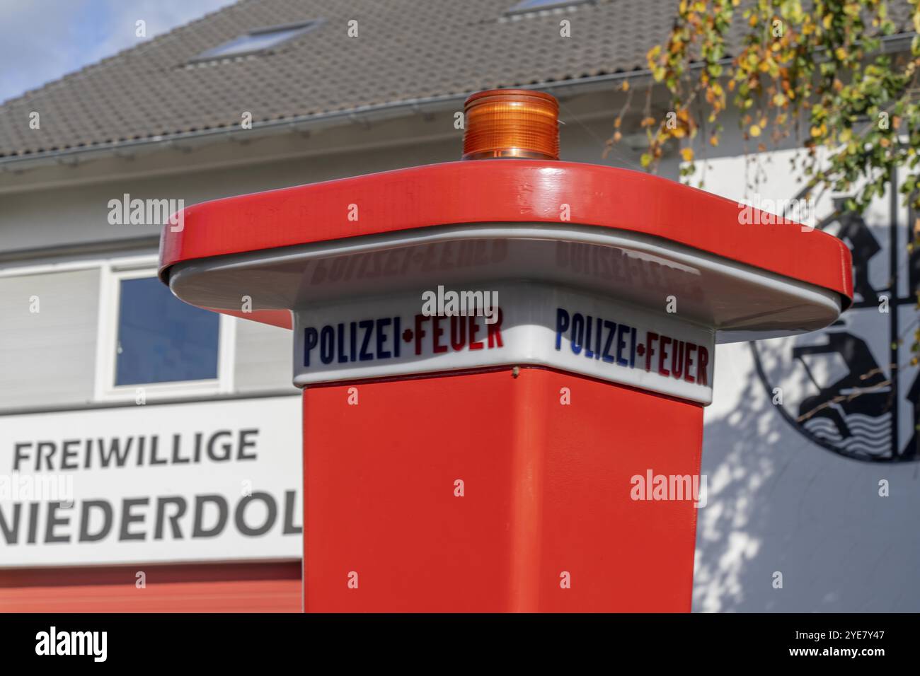 Old emergency call pillar, decoration in front of the Koenigswinter ...