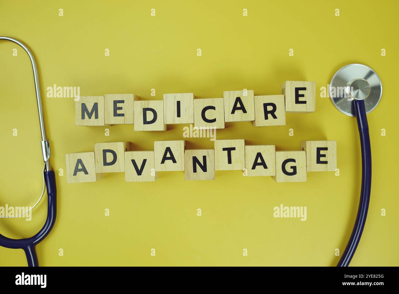 Medicare Advantage with wooden blocks alphabet letters and stethoscope ...