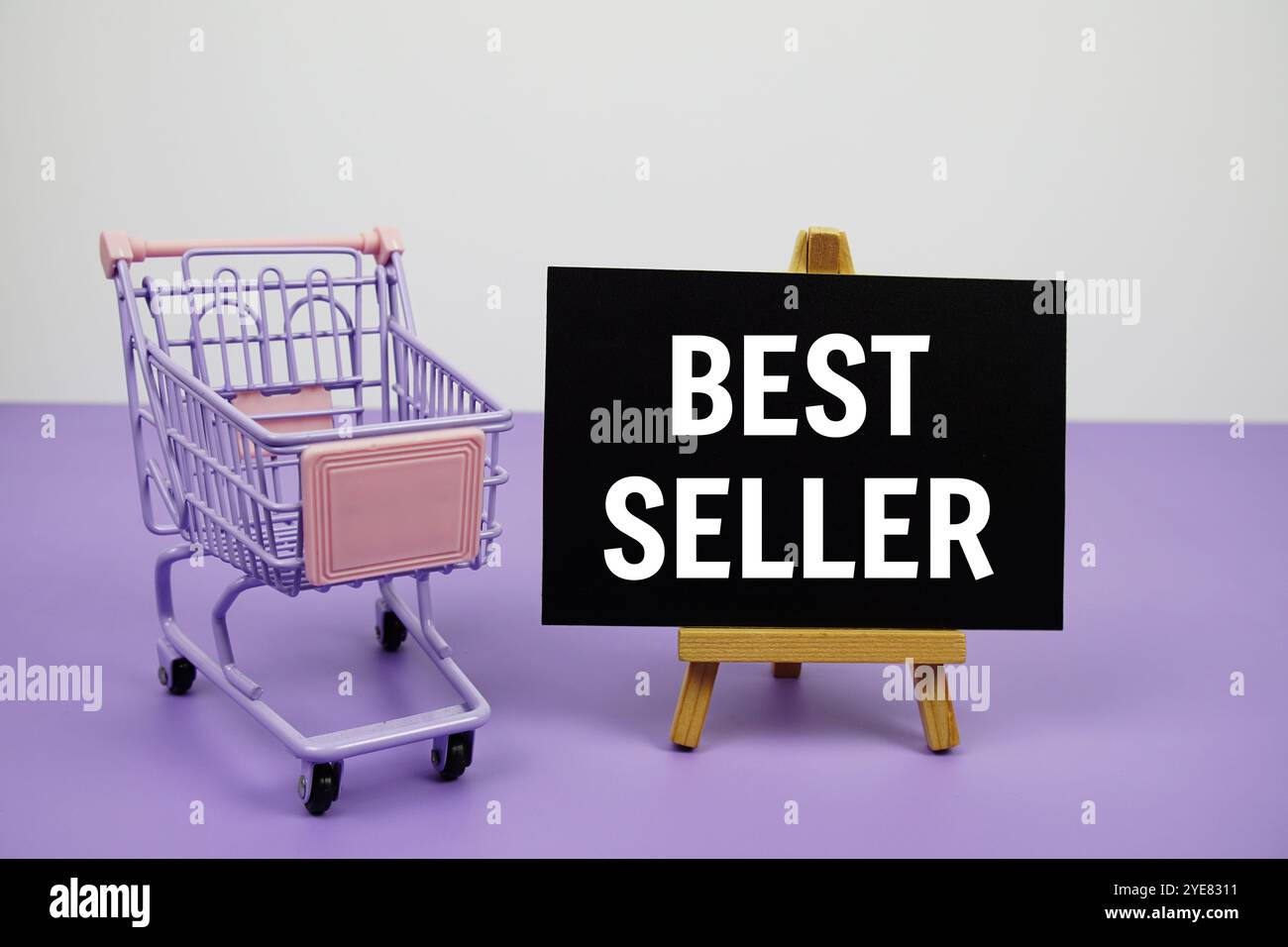 Best Deal text message and trolley shopping cart on purple background ...