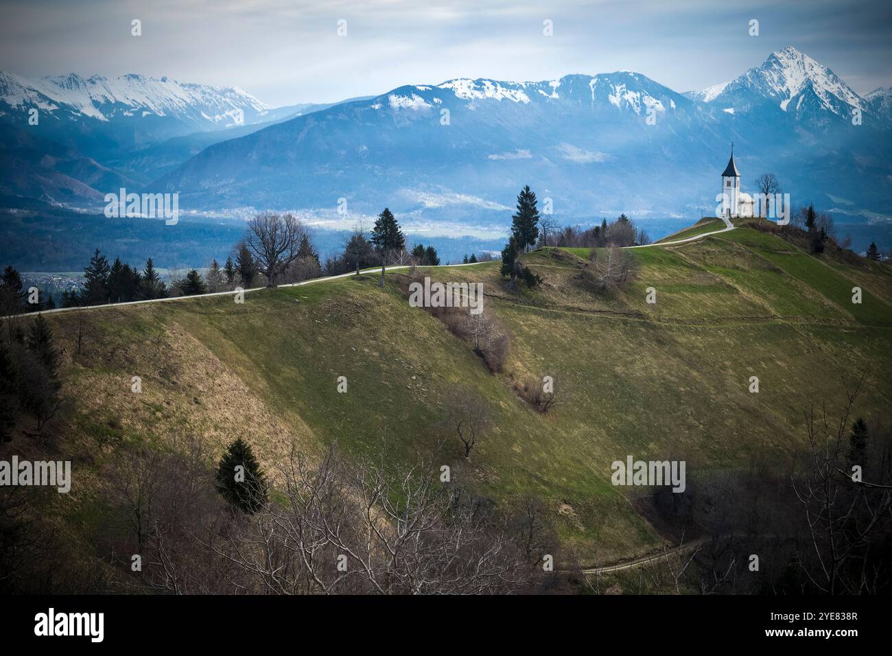 The path to prayer: narrow lane leading out to dramatic site of church ...