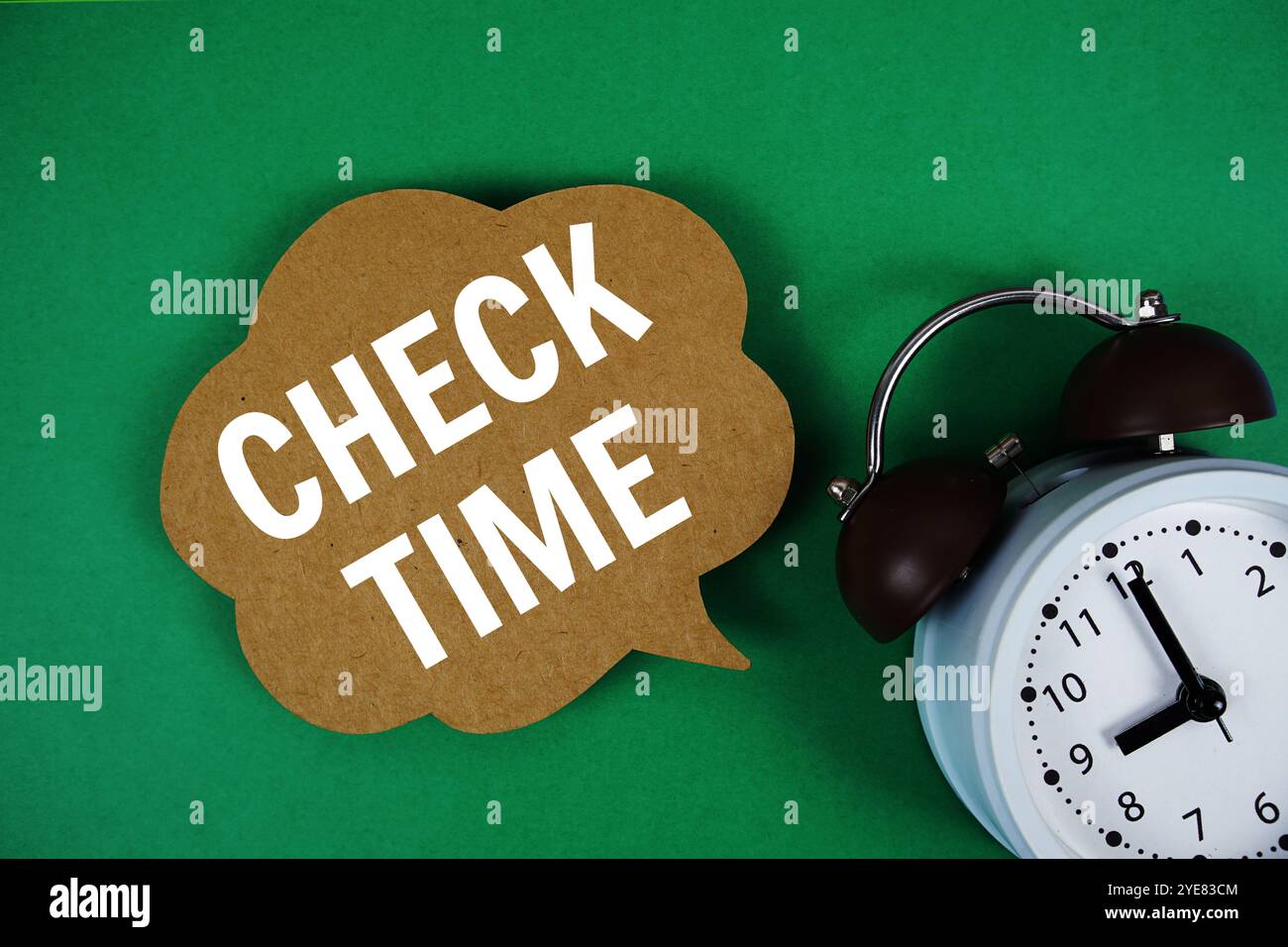 Check Time text on speech bubble with alarm clock on green background ...
