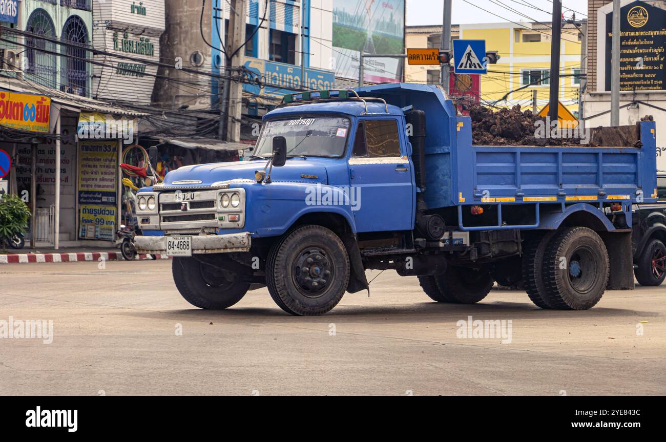 BANGKOK, THAILAND, MAR 09 2024, An old truck loaded with soil is ...