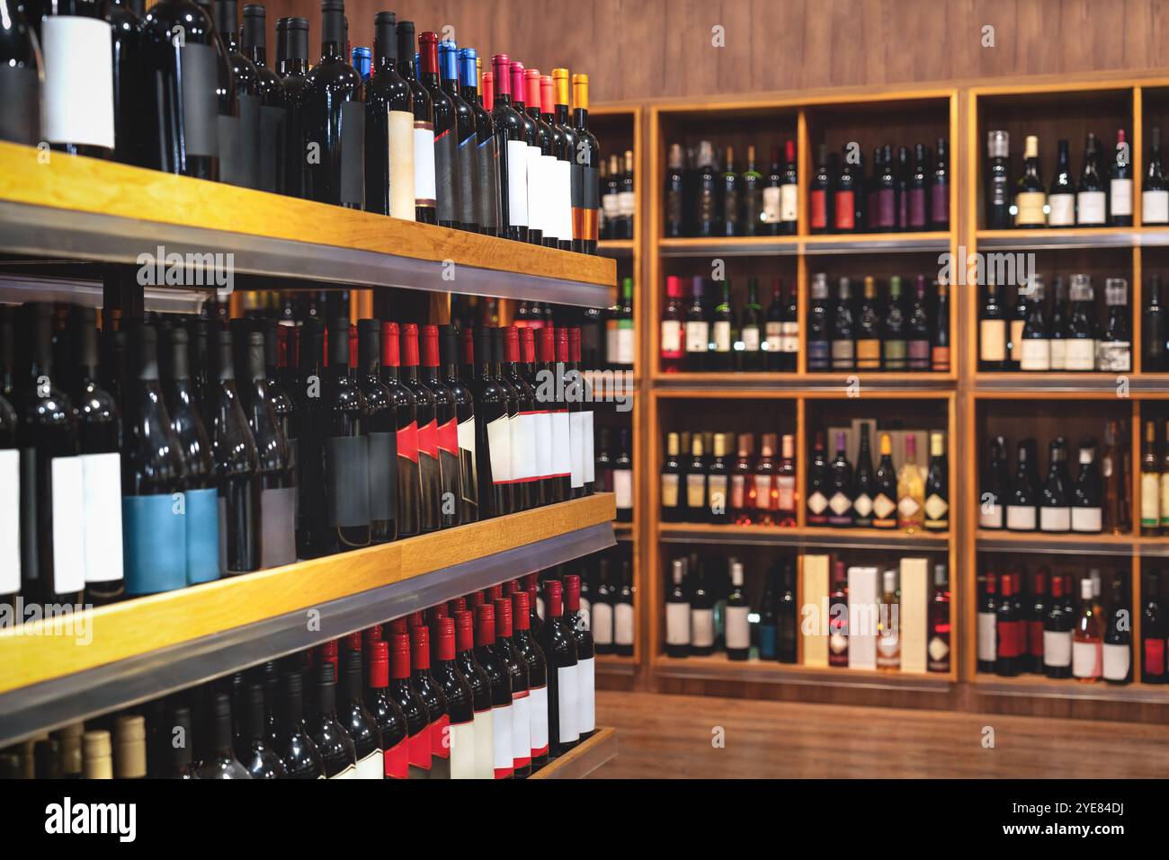 Liquor store background. Alcohol retail industry. Wine bottles on ...