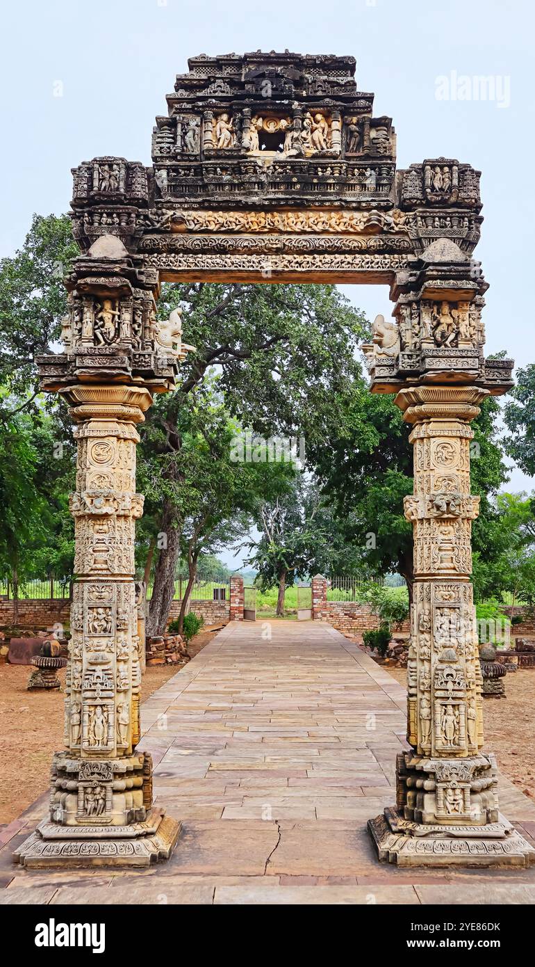 Carved toran (decorative arch) located outside the Mohajmata Temple ...