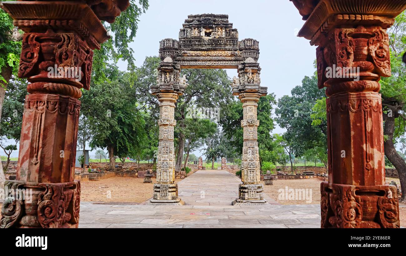 Carved pillars of the Mohajmata Temple and its toran (decorative arch ...