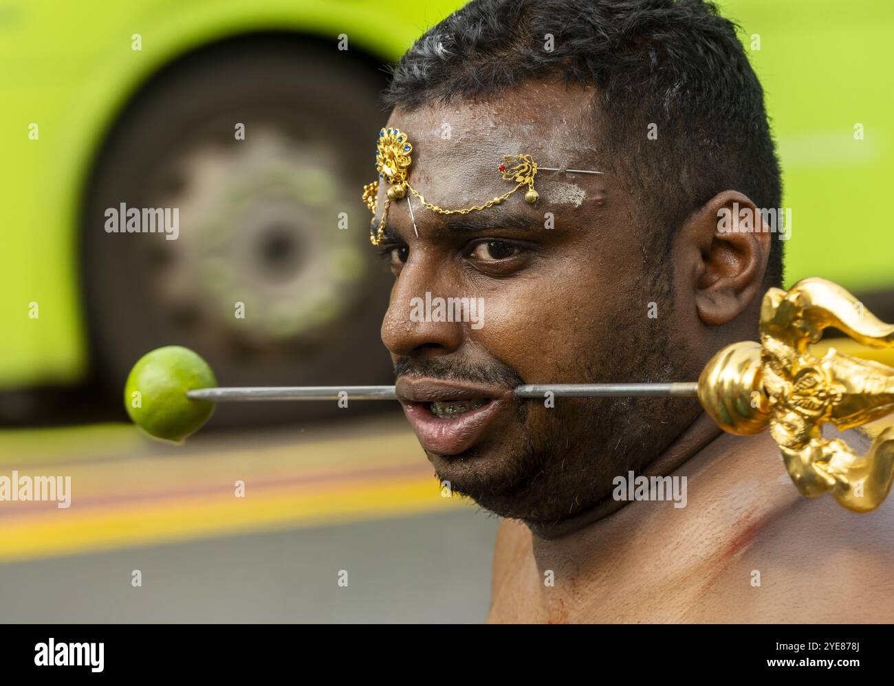 Thaipusam festival in Singapore devotees practice a mortification of ...