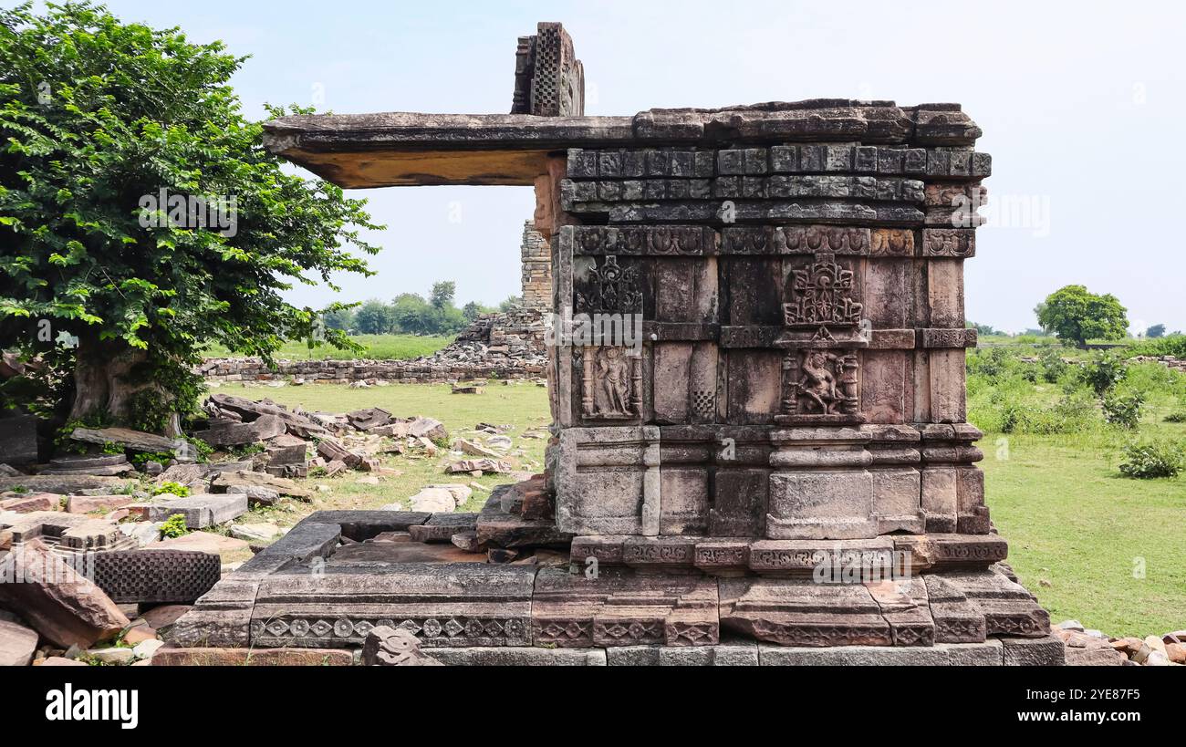 Ruined small shrines surrounding the Mahadev Ghat Temple Group, located ...