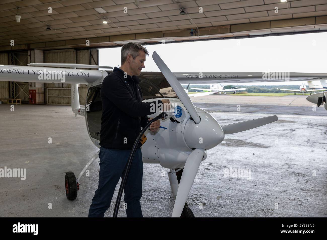 Former RAF pilot Adam Twidell with the Pipistrel Velis Electro Britain ...