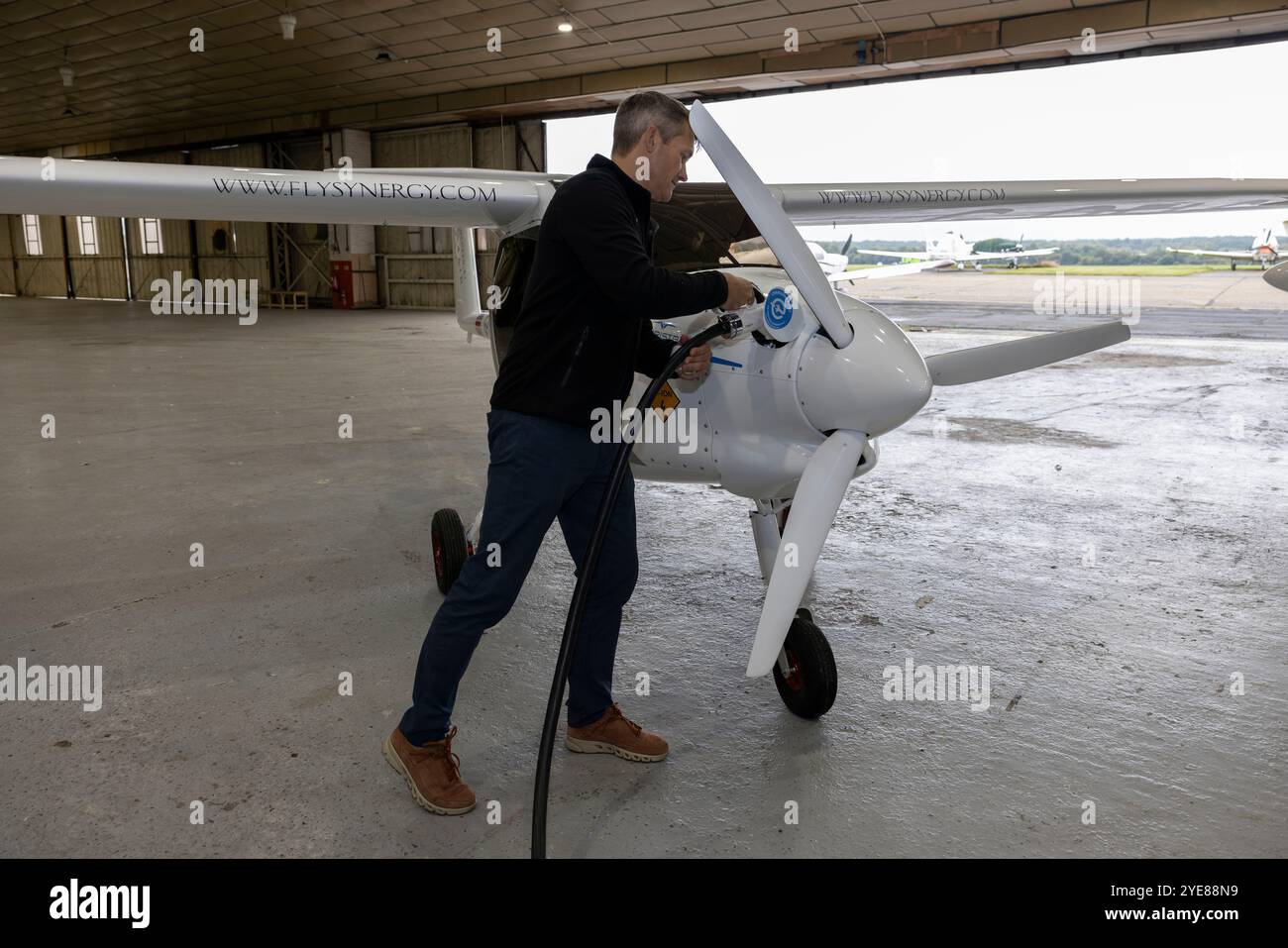 Former RAF pilot Adam Twidell with the Pipistrel Velis Electro Britain ...