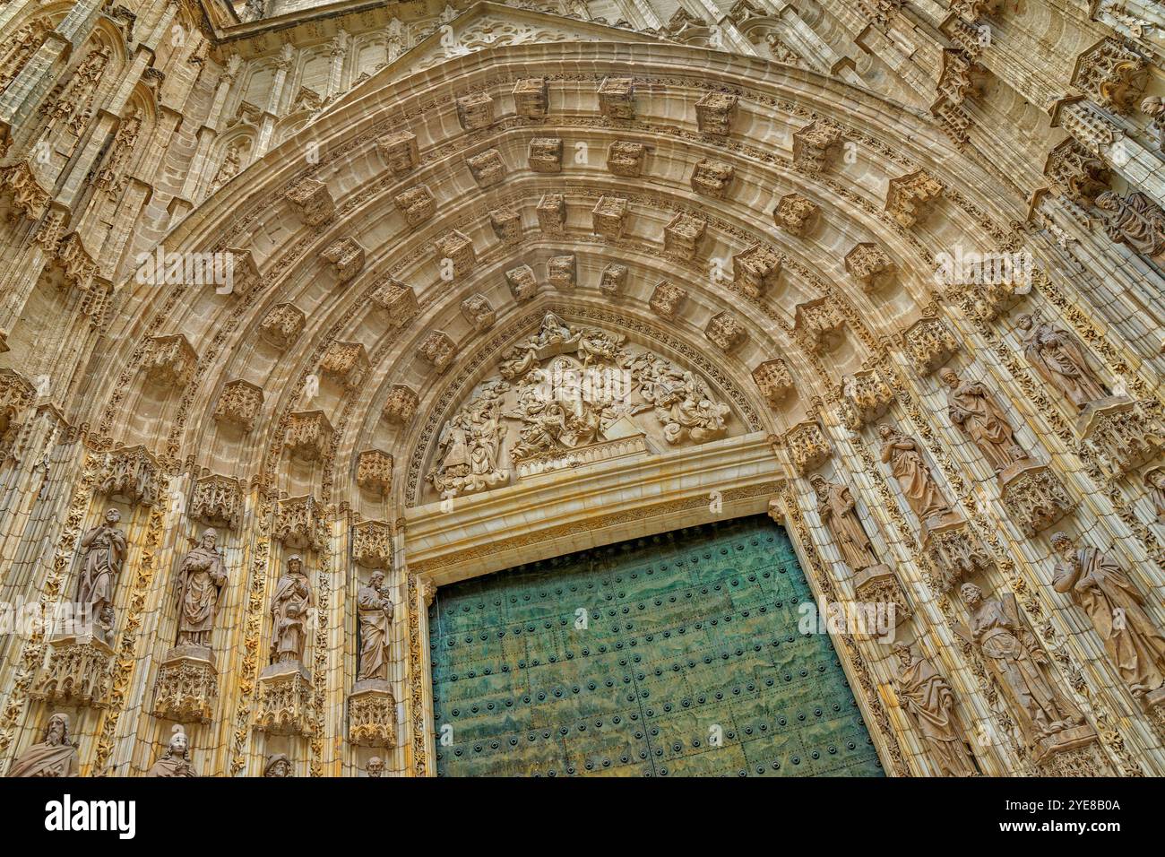 Door of Assumption, decorative main door arch of Seville Cathedral ...