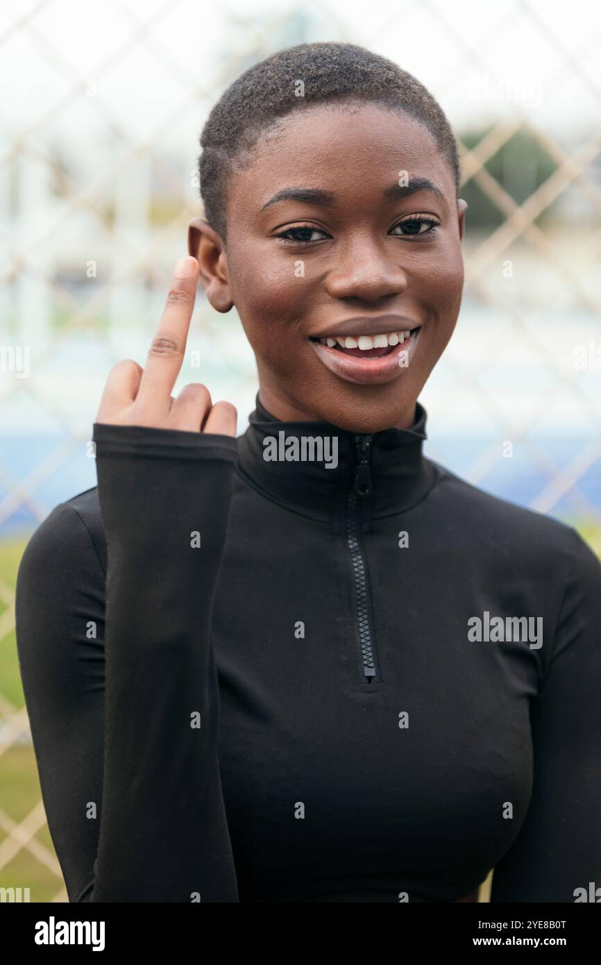 african american female showing middle finger Stock Photo - Alamy
