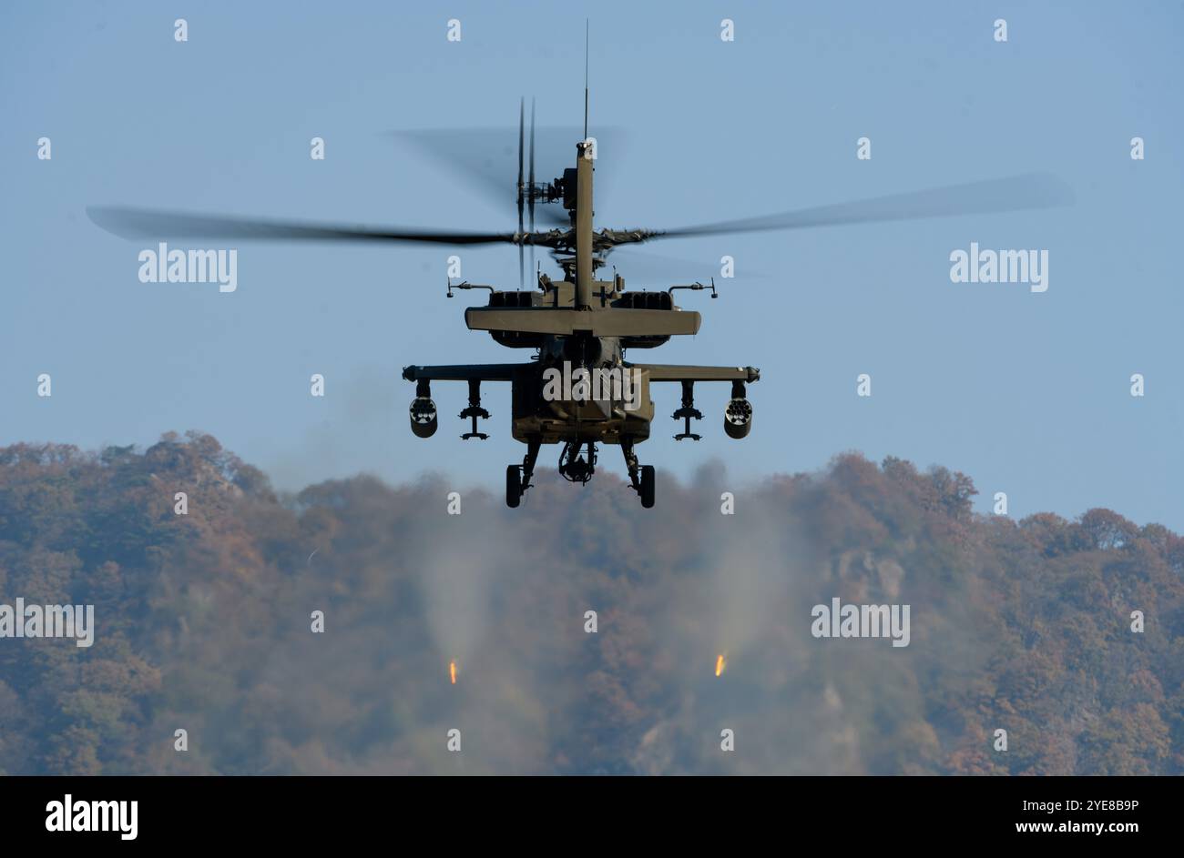 A South Korean army AH-64 Apache helicopter fires 2.75-inch air-to ...