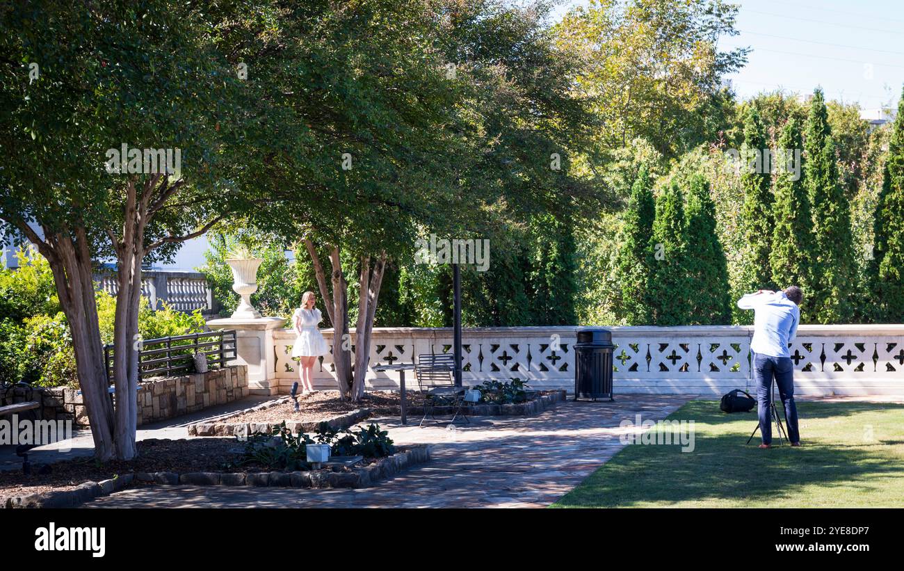 Charlotte, NC, USA-Oct. 20, 2024: Photographer and model doing portrait ...