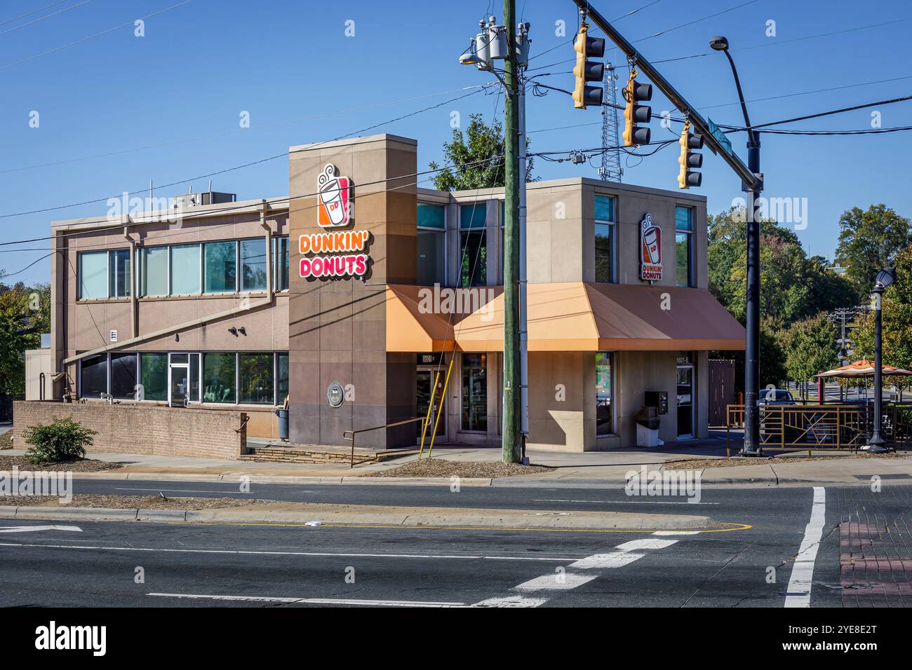 Charlotte, NC, USA-Oct. 20, 2024: Dunkin' Donuts building, corner of ...