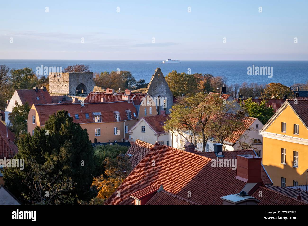 Rooftops and ruins of a medieval church and old houses, Visby, Swede ...