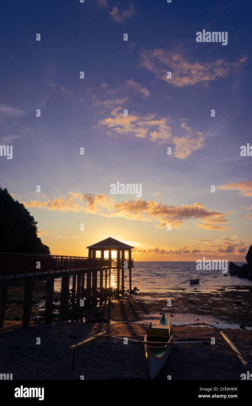 Sunset on a gazebo by the beach. Portrait. Bil-At Point, Ferrol ...