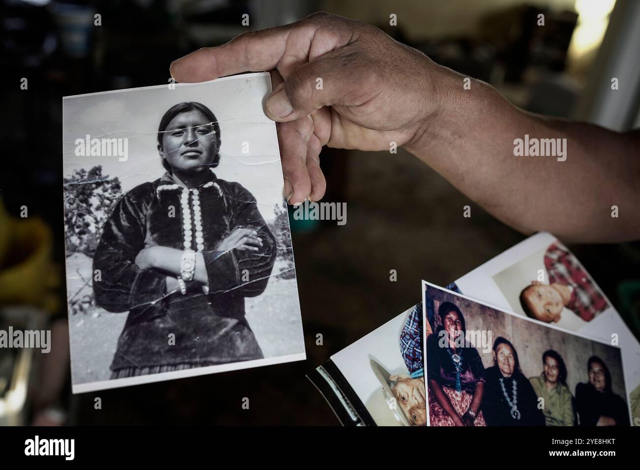 Richard Begay shows a portrait of his mother, at his home on the Navajo ...