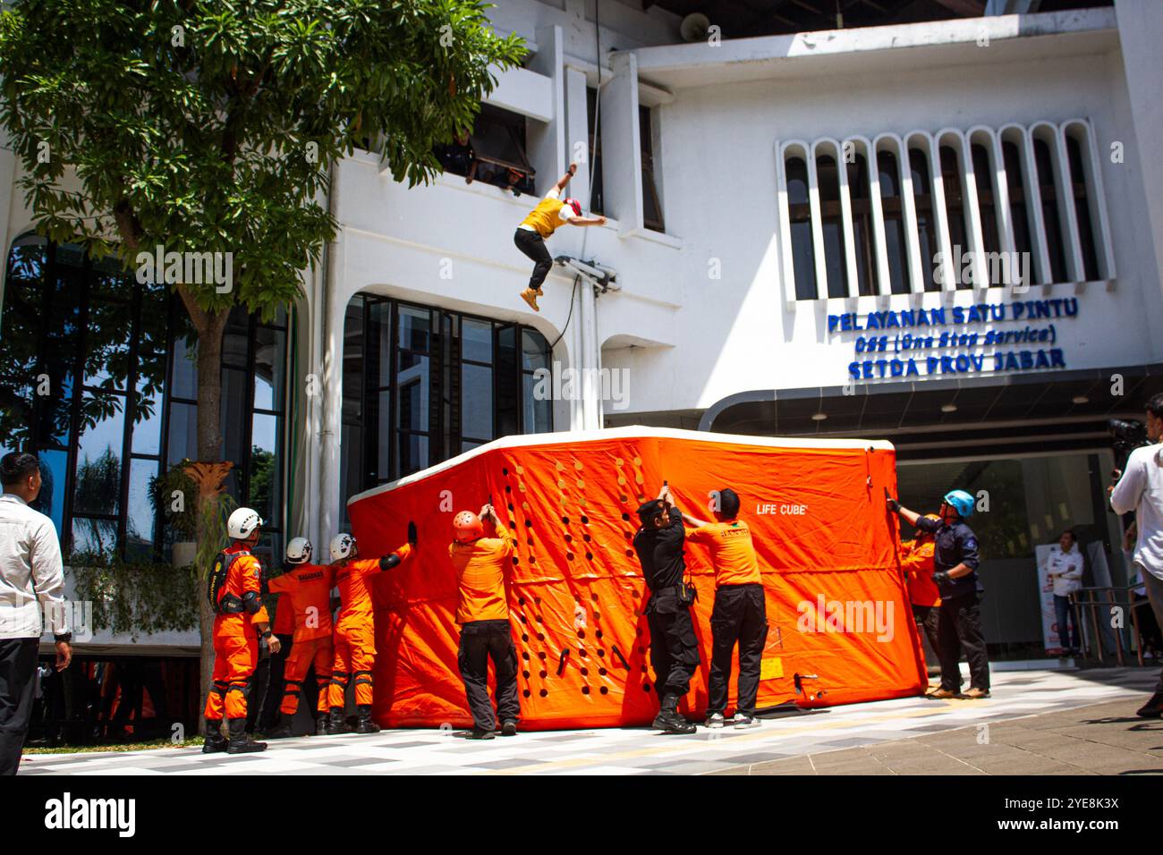 People take a part in an earthquake drill for disaster risk reduction ...