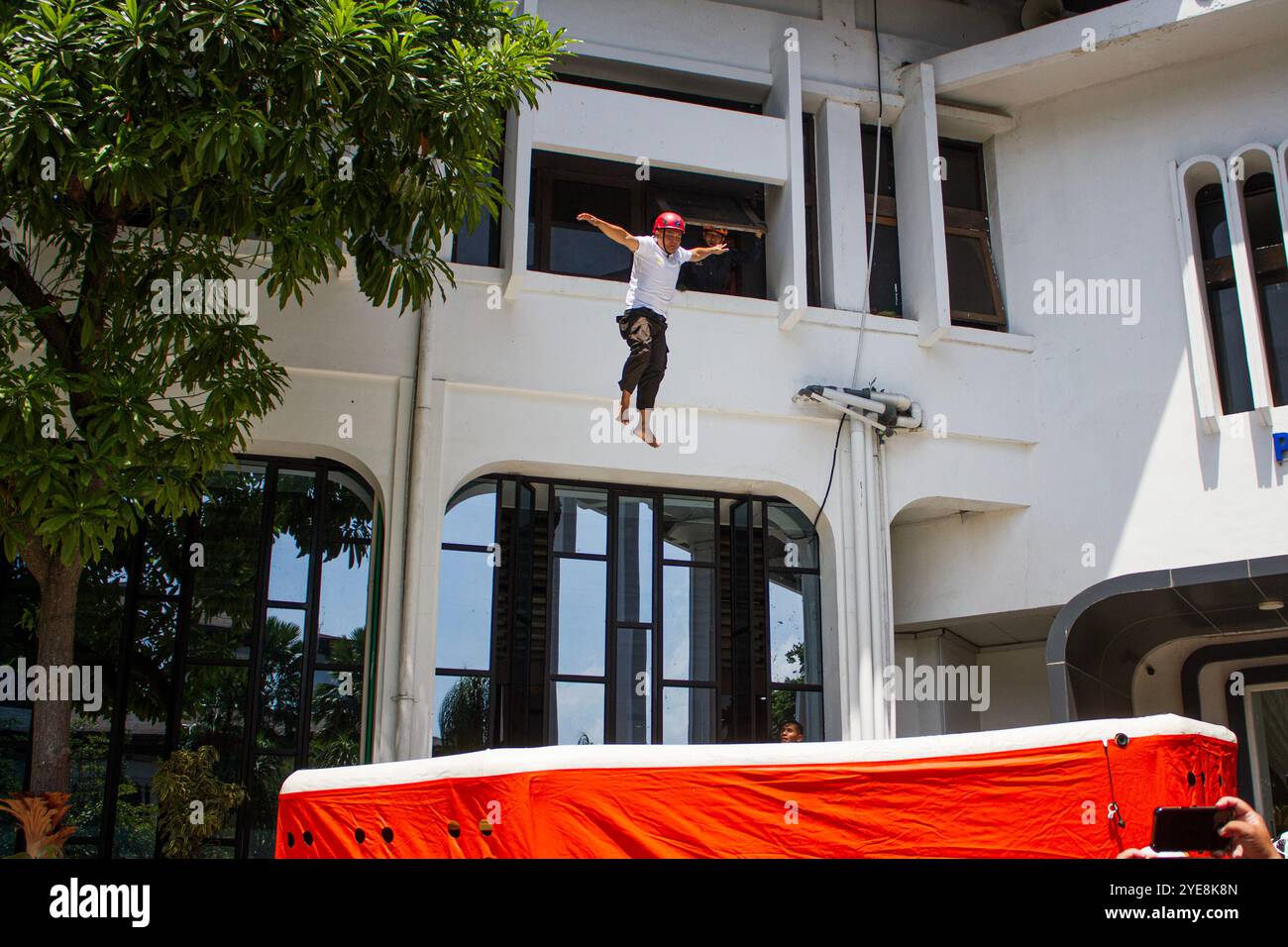 People take a part in an earthquake drill for disaster risk reduction ...