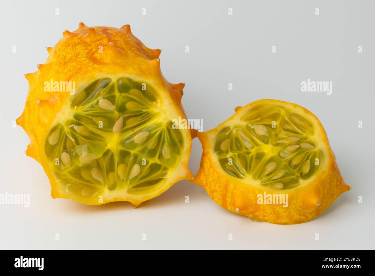 Cucumis metuliferus in section on white background. African horned ...