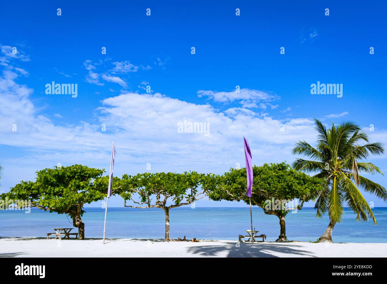Tropical white sand beach in a blue sky sunny day. Aglicay, Romblon ...