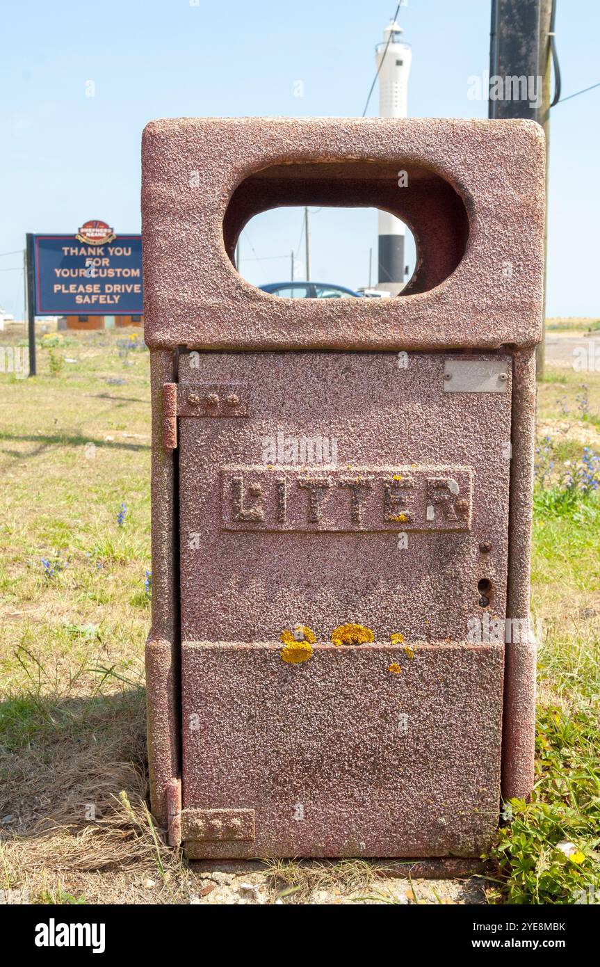 Rusty bin on the beach, Dungeness New Romney with a big sign on the ...
