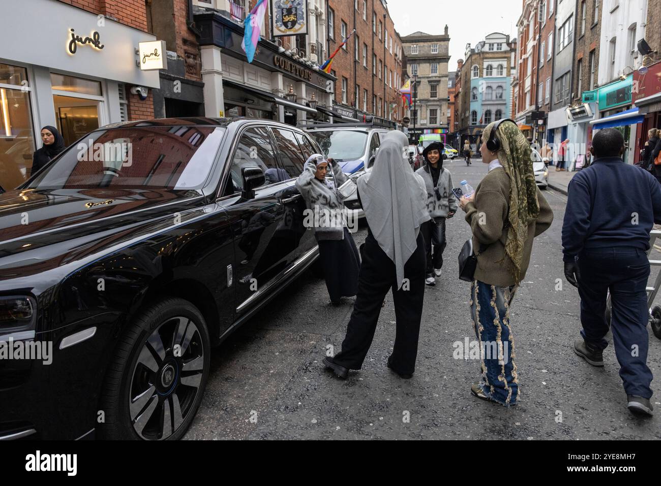 Middle eastern tourists take selfie's outside their luxury vehicle ...