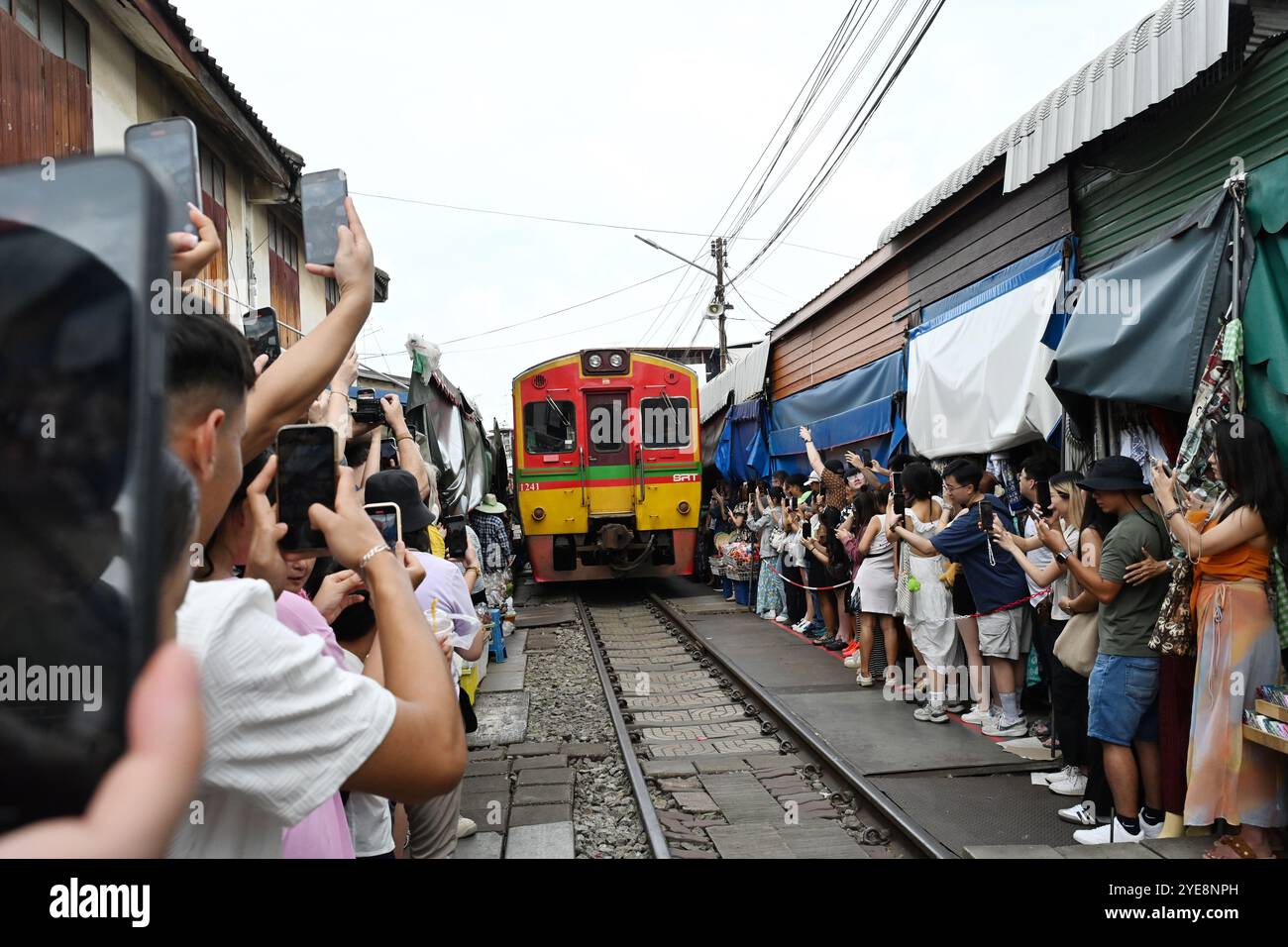 "Railway market Thailand" Tourists thrilled to see the train passing ...