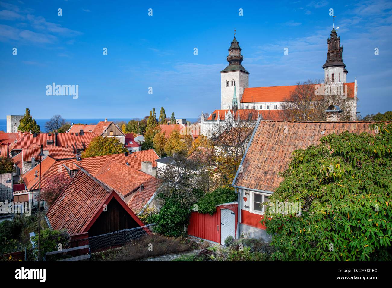 Rooftops and ruins of a medieval church and old houses, Visby, Sweden ...