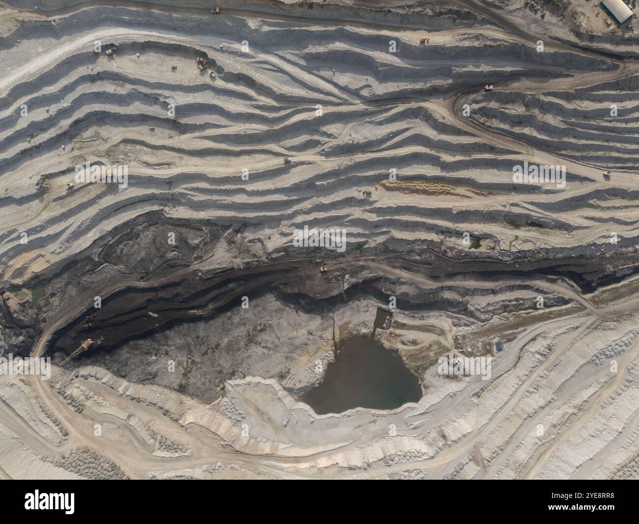 Stepped serpentine roads for equipment in an open pit coal mine Stock ...