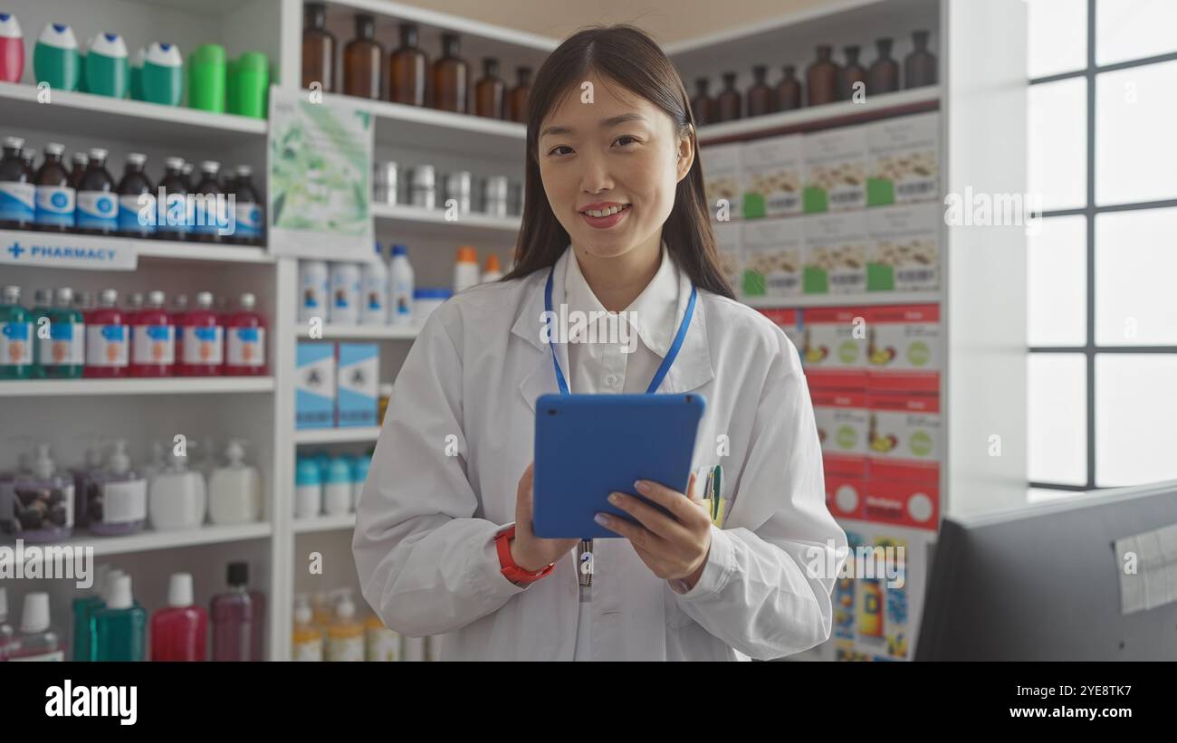 Chinese female pharmacist in hi-res stock photography and images - Alamy