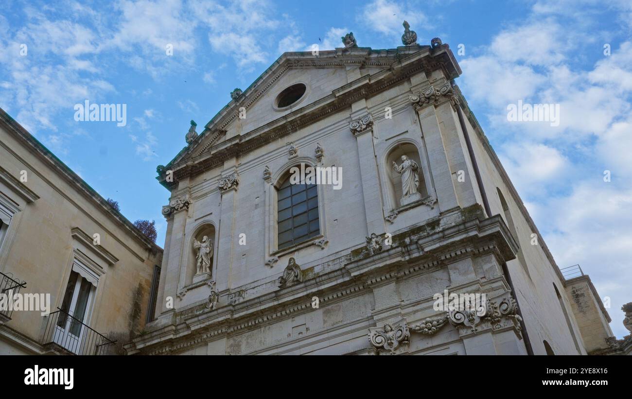 A stunning historical building facade with intricate stone carvings and ...