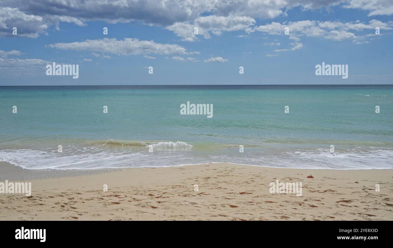 Beautiful beach scene in pescoluse, salento, with clear blue waters and ...