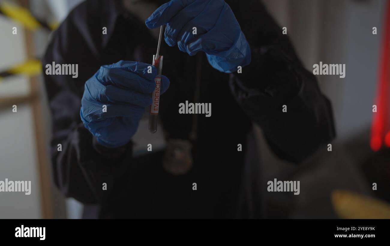 A man in gloves examines a test tube labeled 'evidence' at an indoor ...