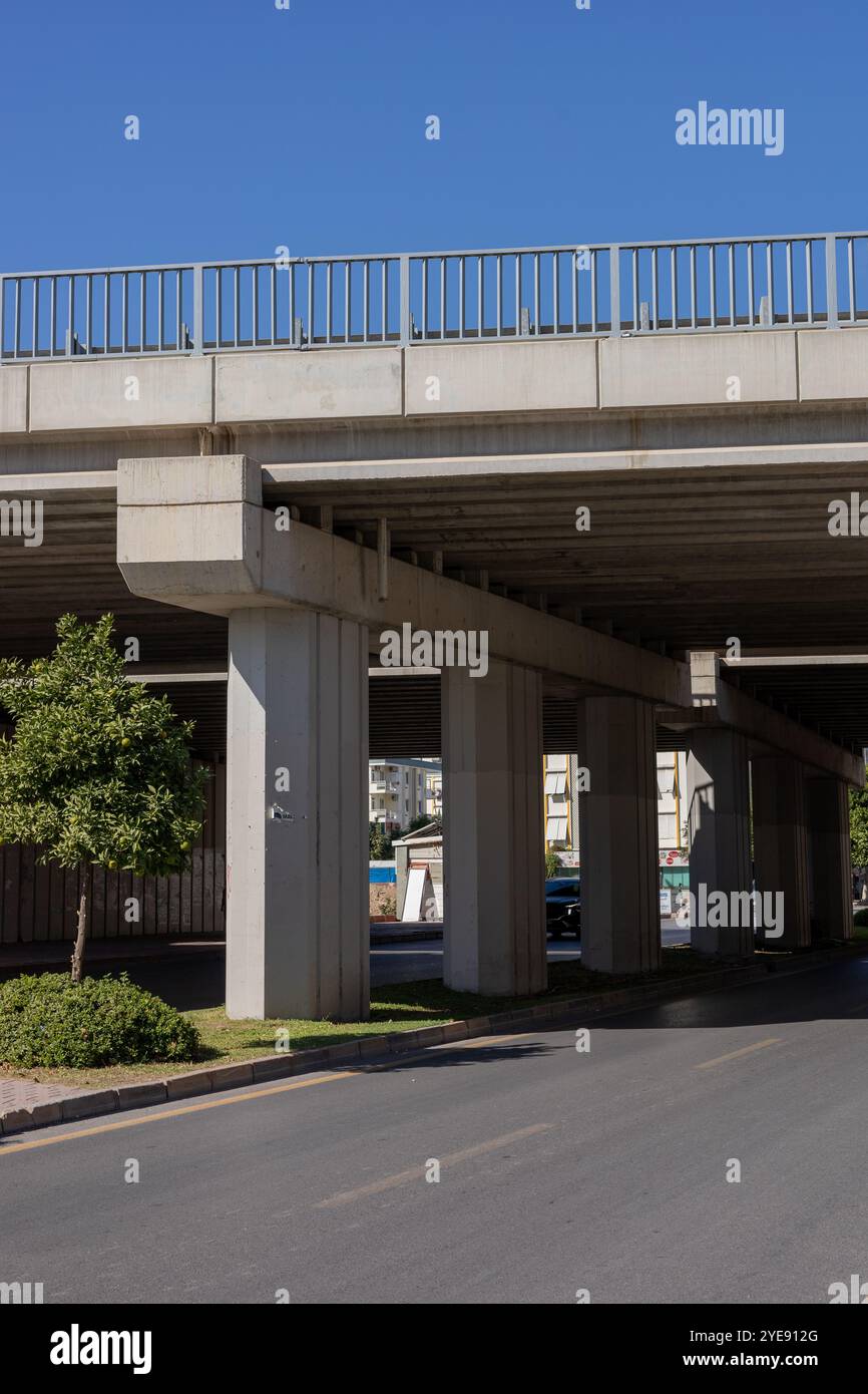 Urban infrastructure features an elevated road structure on a clear day ...